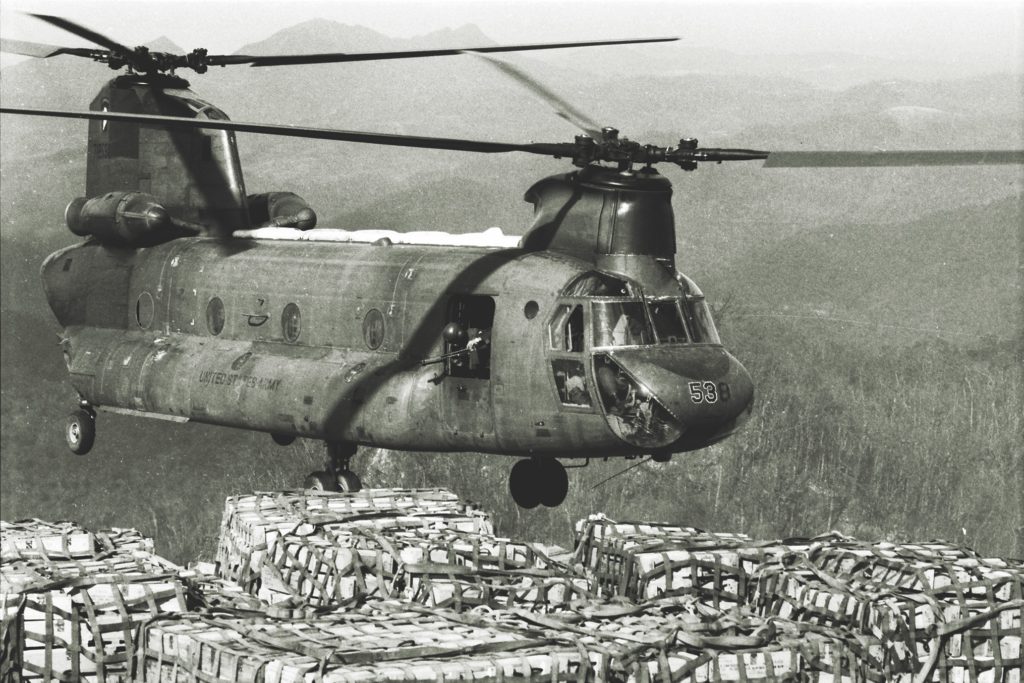 CHINOOK: An Army Boeing CH-47 Chinook hovers near delivered supplies at ...