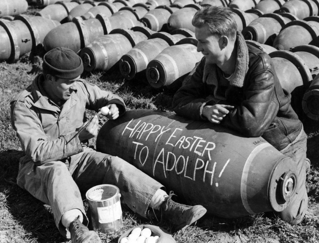 Two U.S. soldiers writing Easter greetings to Hitler, Italy, March 1944 ...