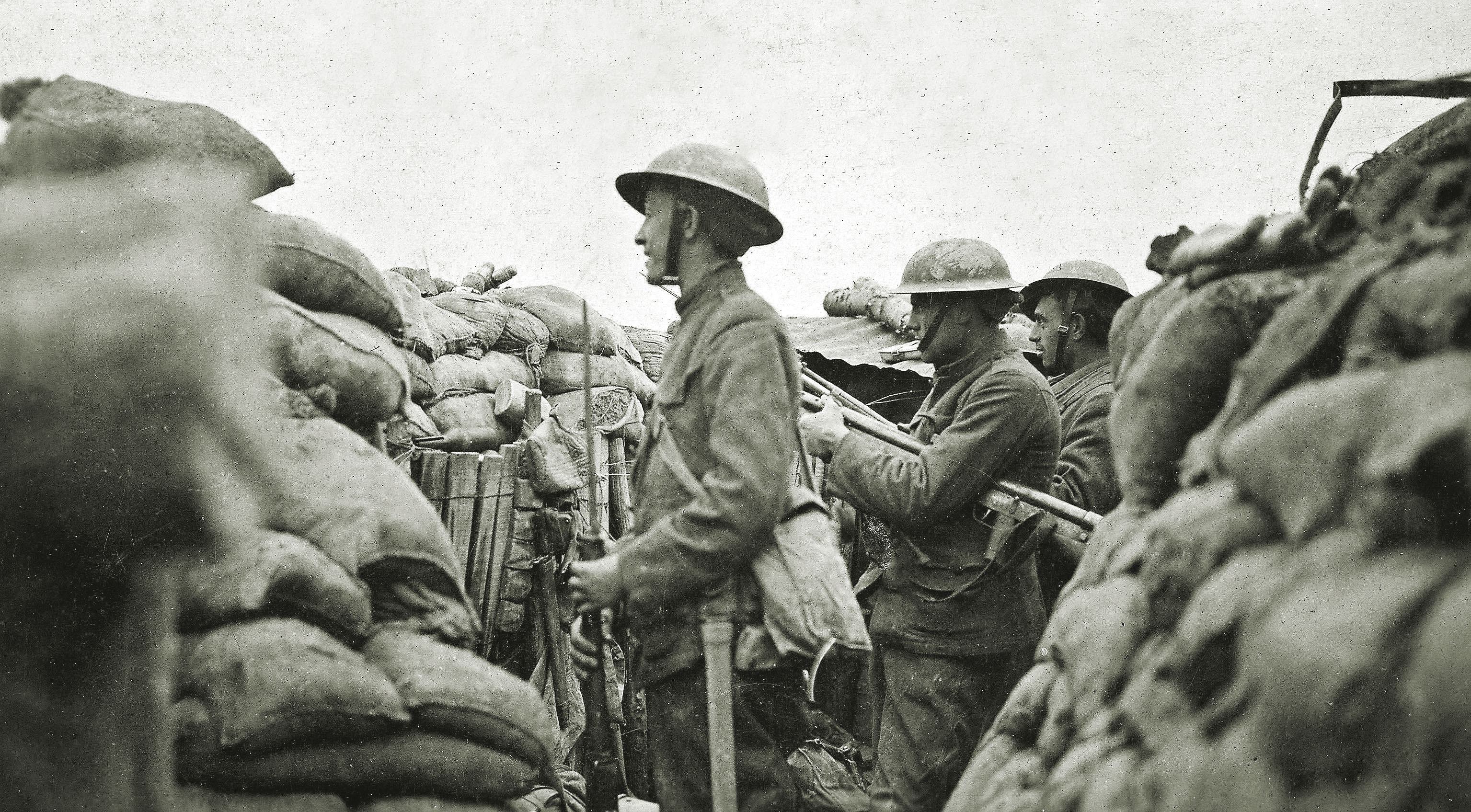 Members of the 1st Division’s 16th Infantry Regiment settle into their ...