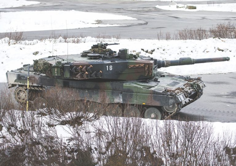 A Panzer 87 Leopard, a Swiss-made variant of the German Leopard 2A4 ...