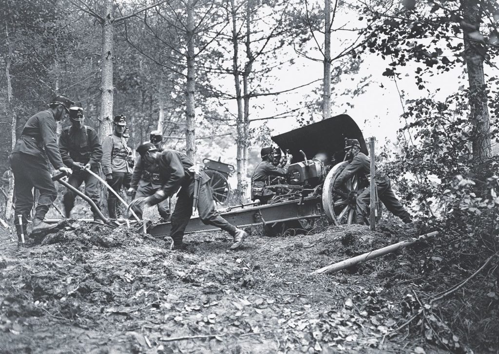 Members of the 3rd Howitzer Battery train on their 150 mm gun during ...