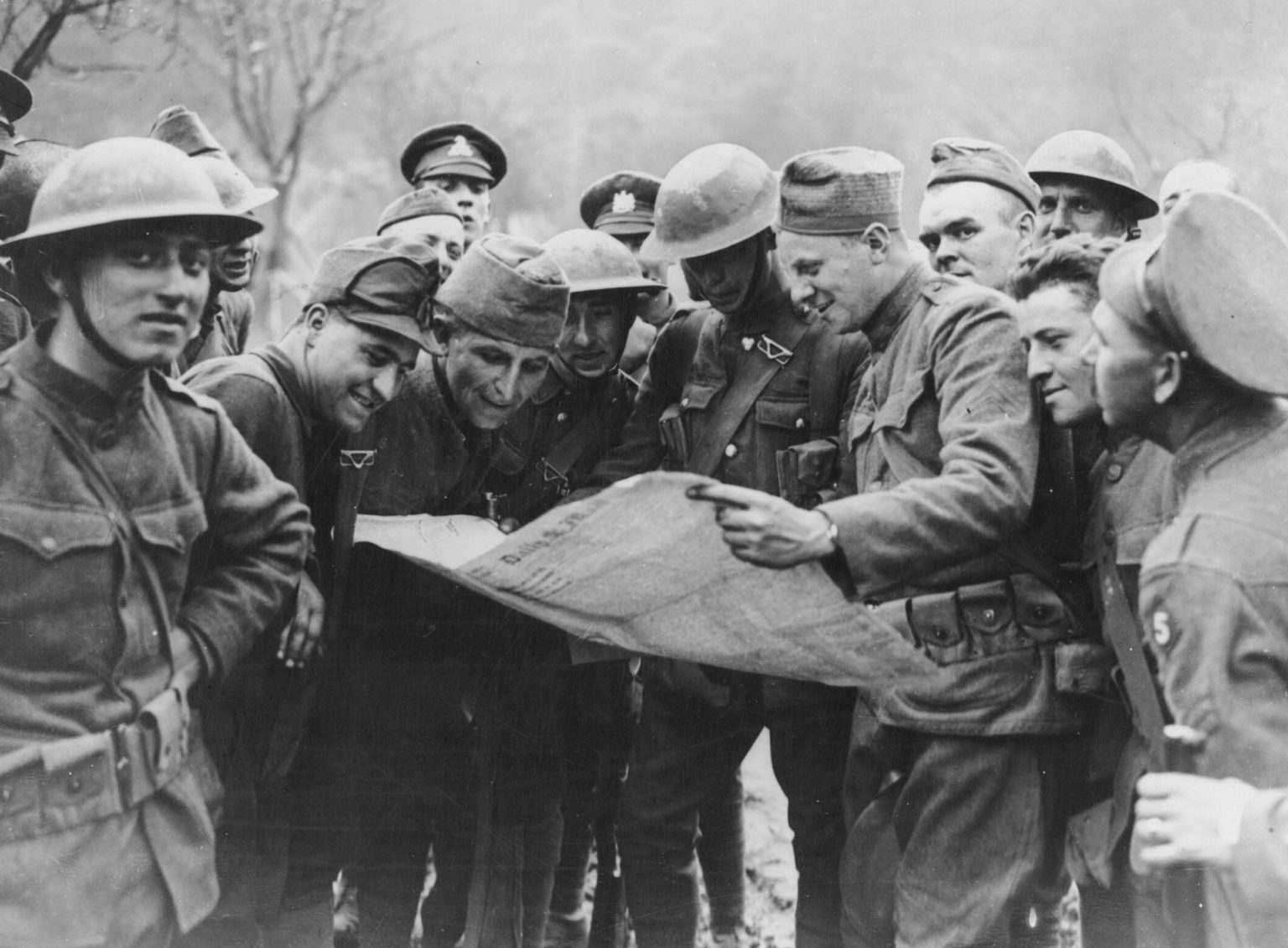 Americans-and-British-read-newspaper-World-War-1-Western-Front | HistoryNet
