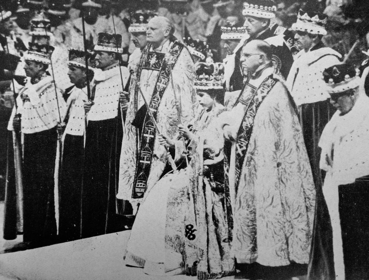 H.M. the Queen wearing St. Edward's Crown and holding the Royal Sceptre ...